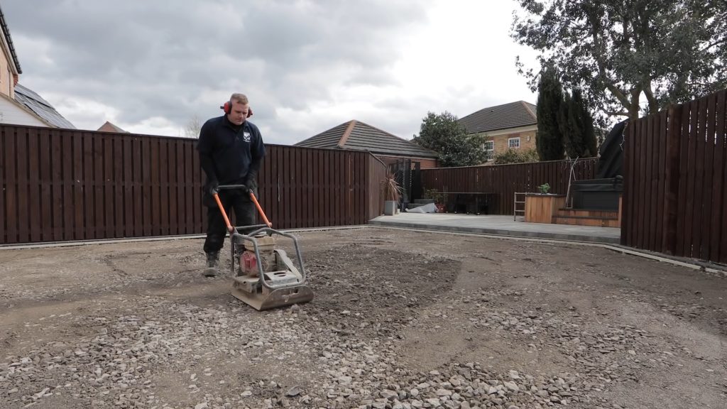 4. Installing Artificial Grass_4_compacting - Professional Builder